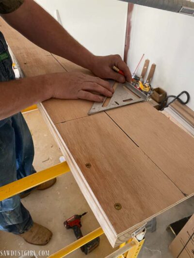 Building and Installing a Giant Faux Beam on the Ceiling